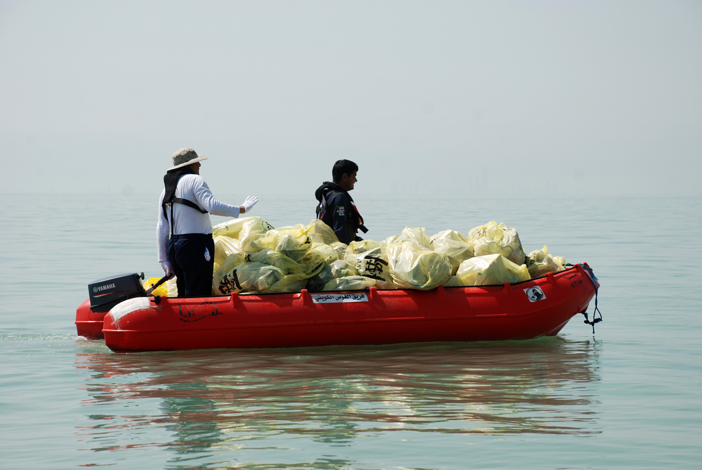 KUNA : Kuwaiti divers clear up spots around Meskan island